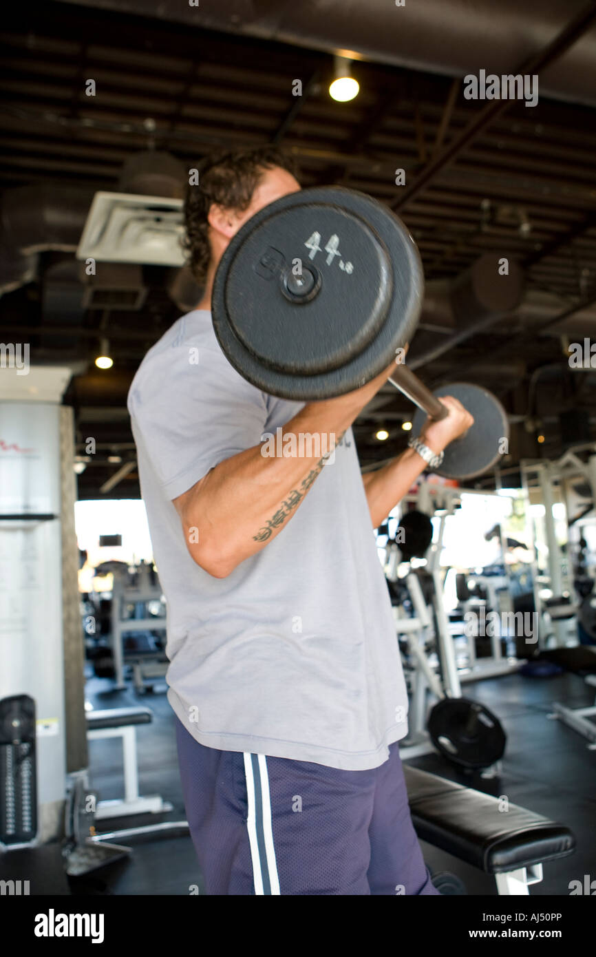 Fit male exercising in a gym Workout Stock Photo - Alamy