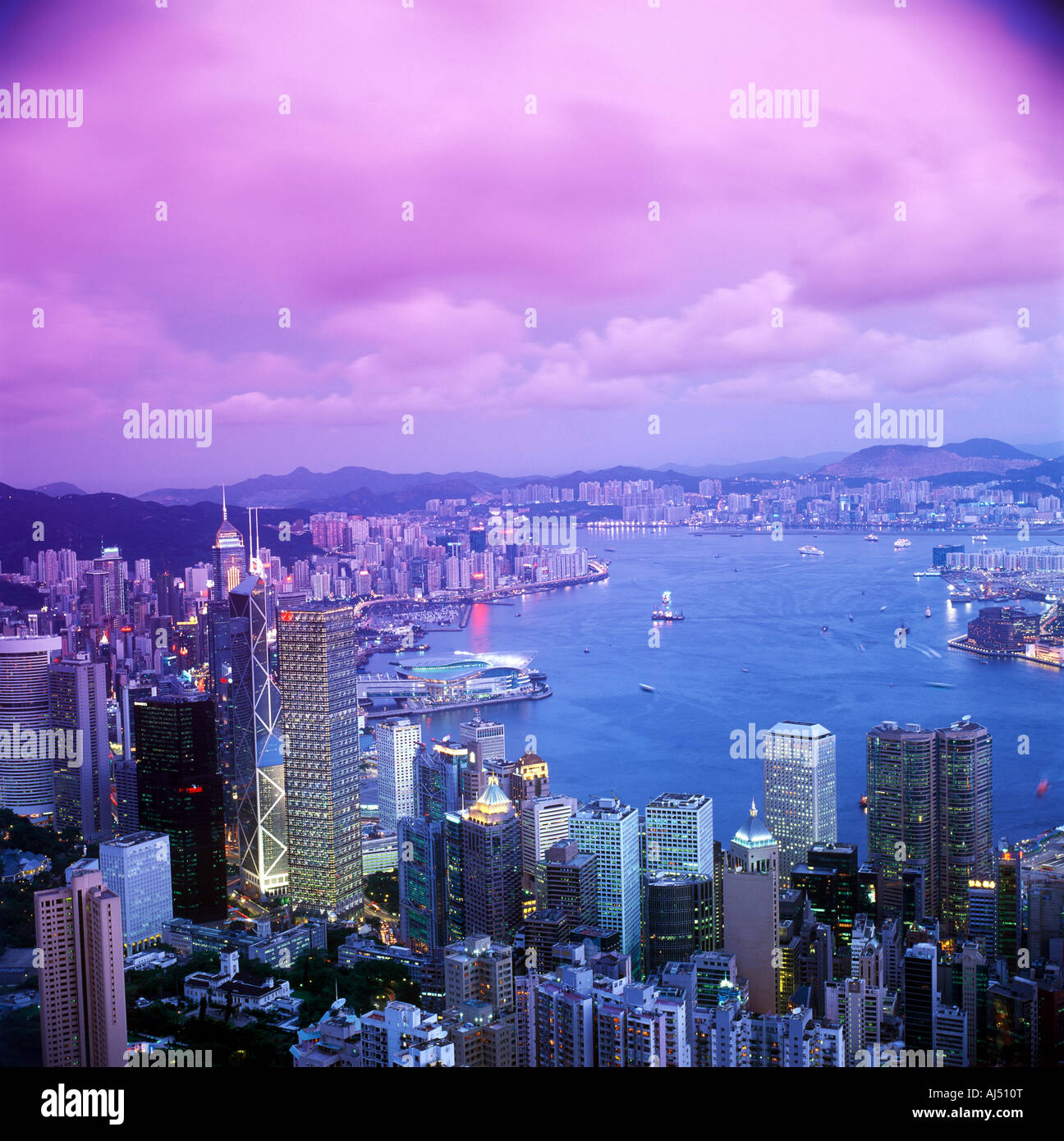 Aerial view of Hong Kong skyline and Victoria Harbour at sunset hours ...