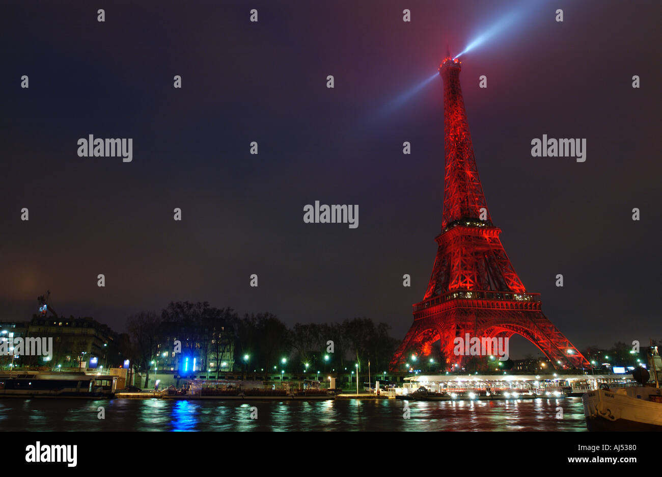 Red illumination on Eiffel tower in the honor of the new chineese year ...