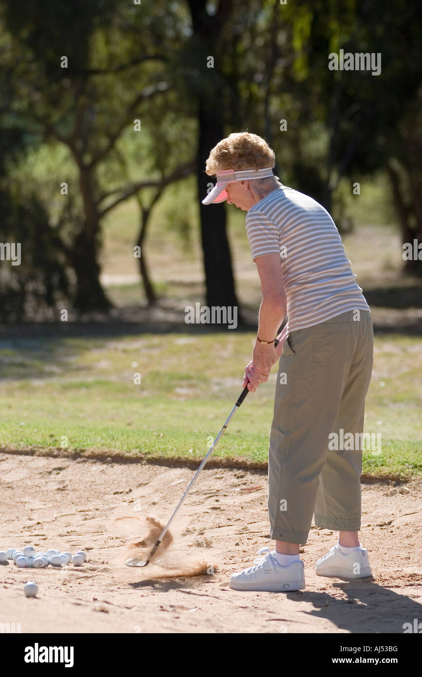 Retired elderly lady playing golf hi-res stock photography and images ...