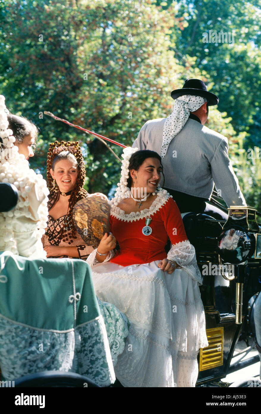 Horse and carriage with two ladies in traditional Goya dress Goyesca ...