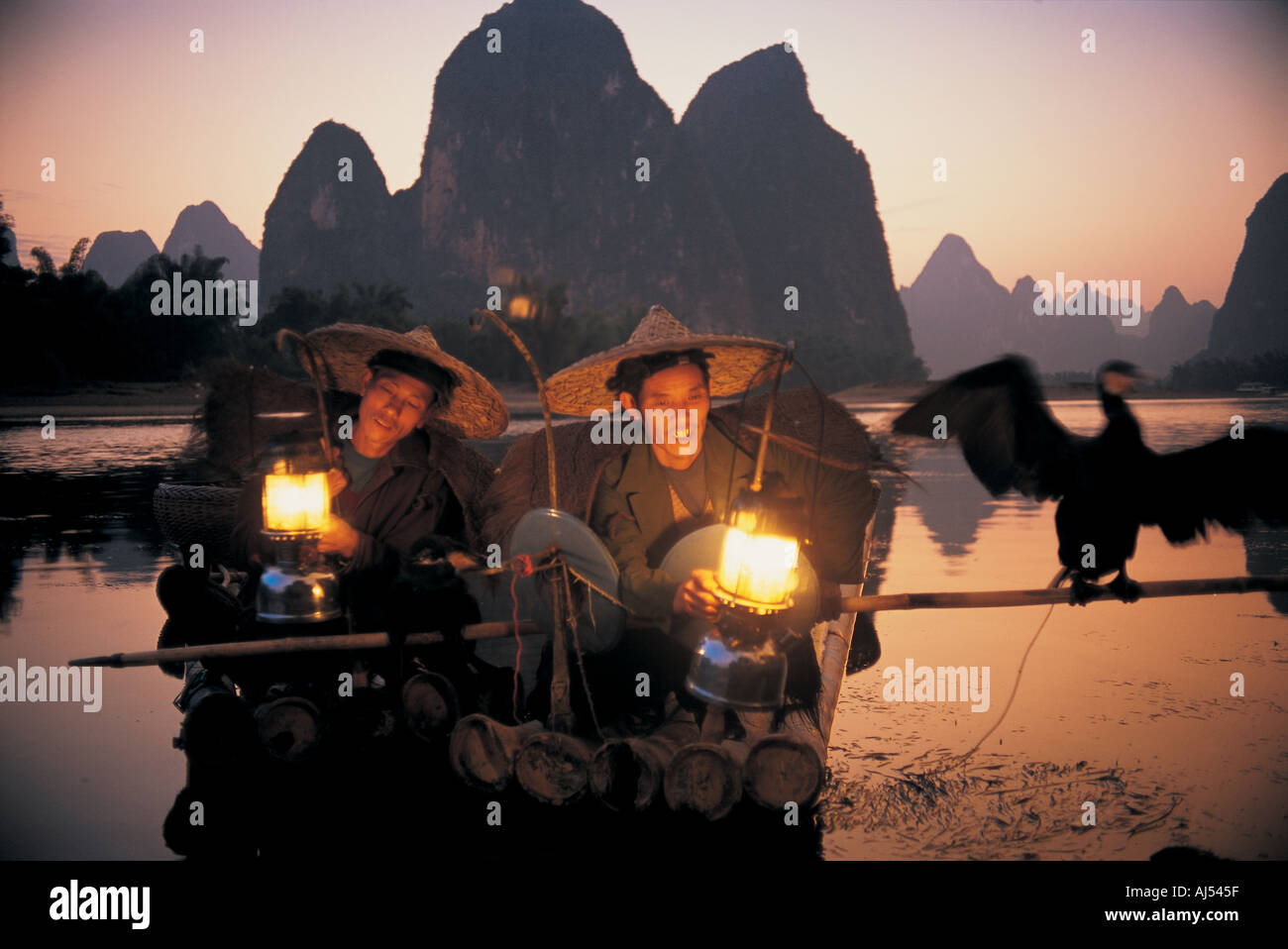 Silhouette chinese cormorant fisherman hi-res stock photography and ...
