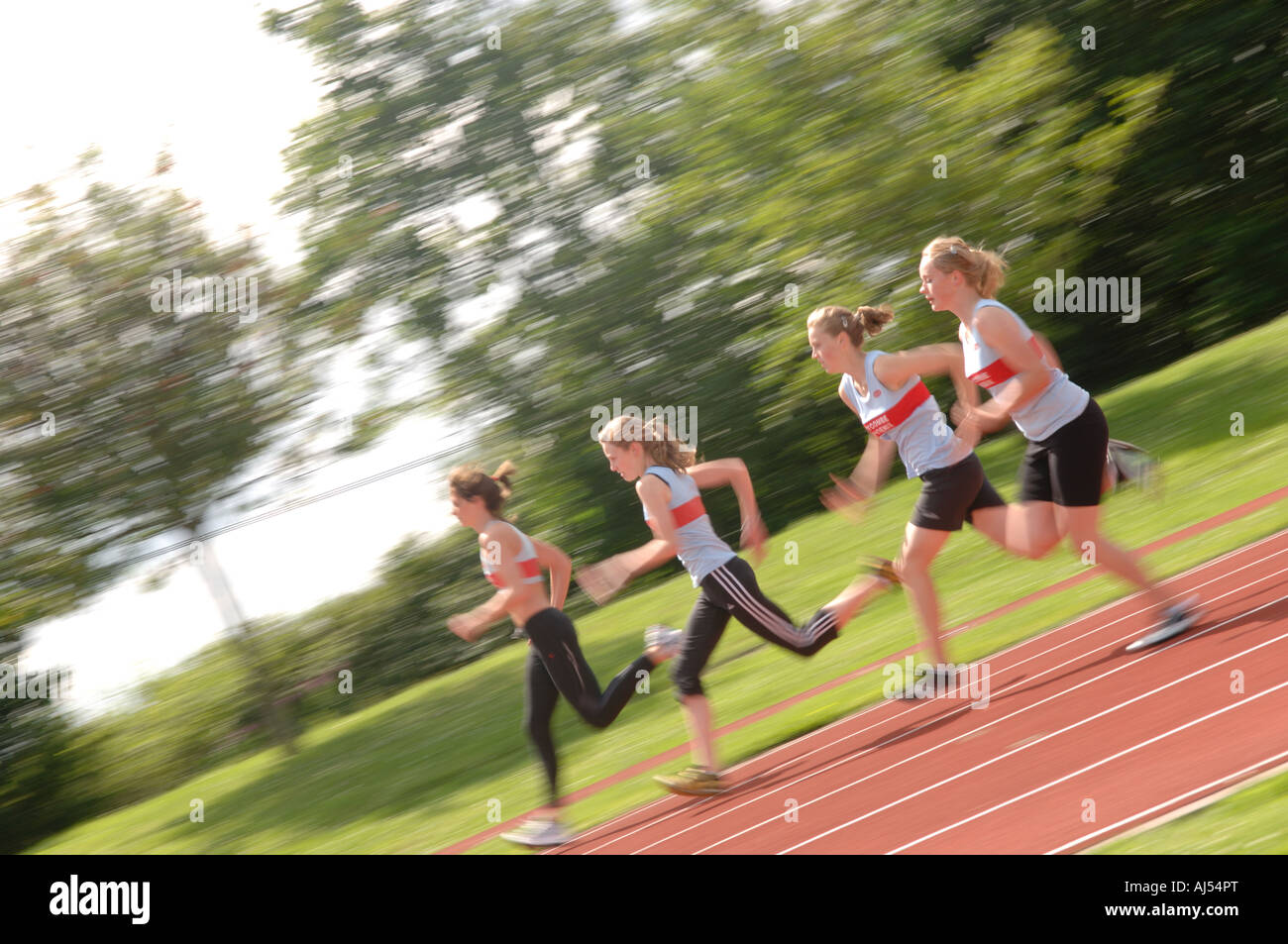 Athletics group running Stock Photo - Alamy