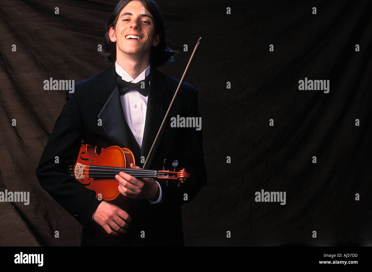 Portrait caucasian male teenage musician with viola - see AJ57DE for ...