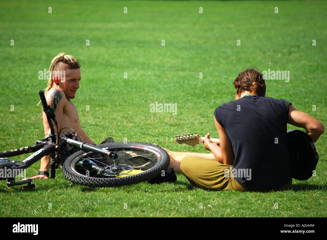 Young men relaxing in Helden-Platz, Vienna, Wein, Republic of Austria ...