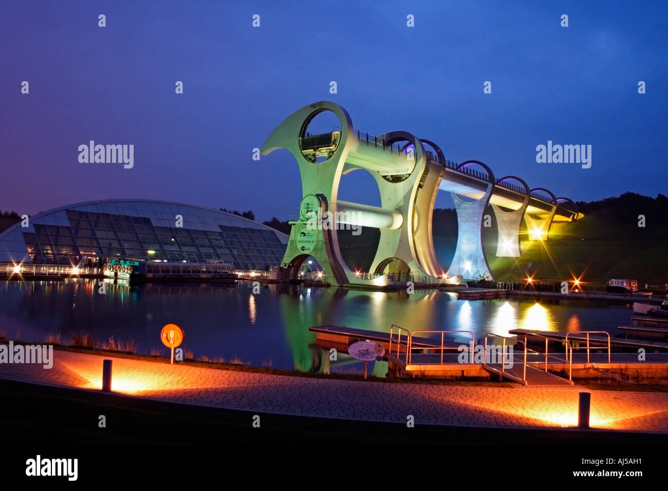 The Falkirk wheel at night illuminated by coloured floodlights, Falkirk ...