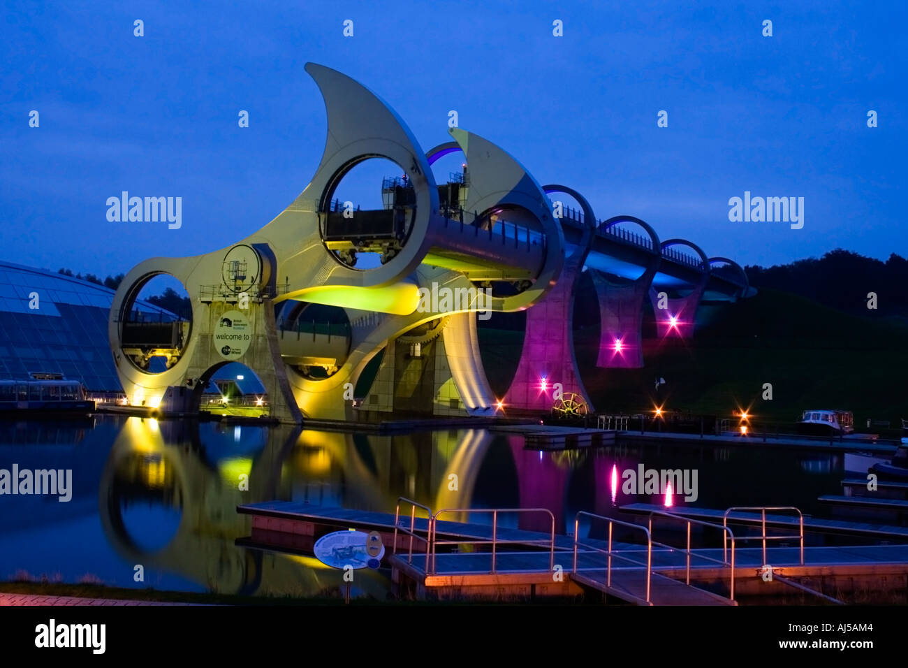The Falkirk wheel at night illuminated by coloured floodlights, Falkirk ...
