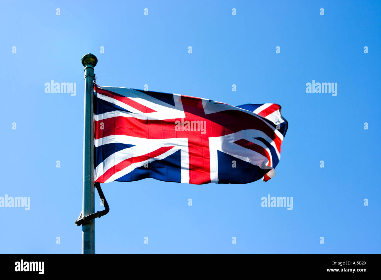 "Union Jack" against blue sky Stock Photo - Alamy