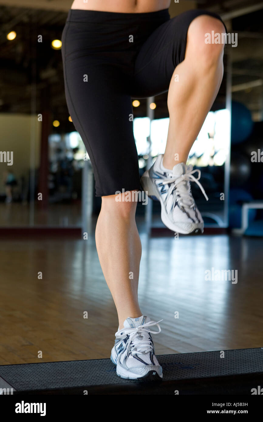 Fit female in great shape exercising in a gym. Aerobic workout Stock ...