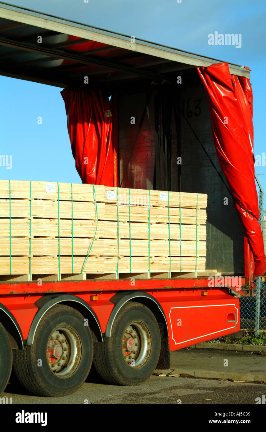 Trailer loaded with timber Stock Photo - Alamy