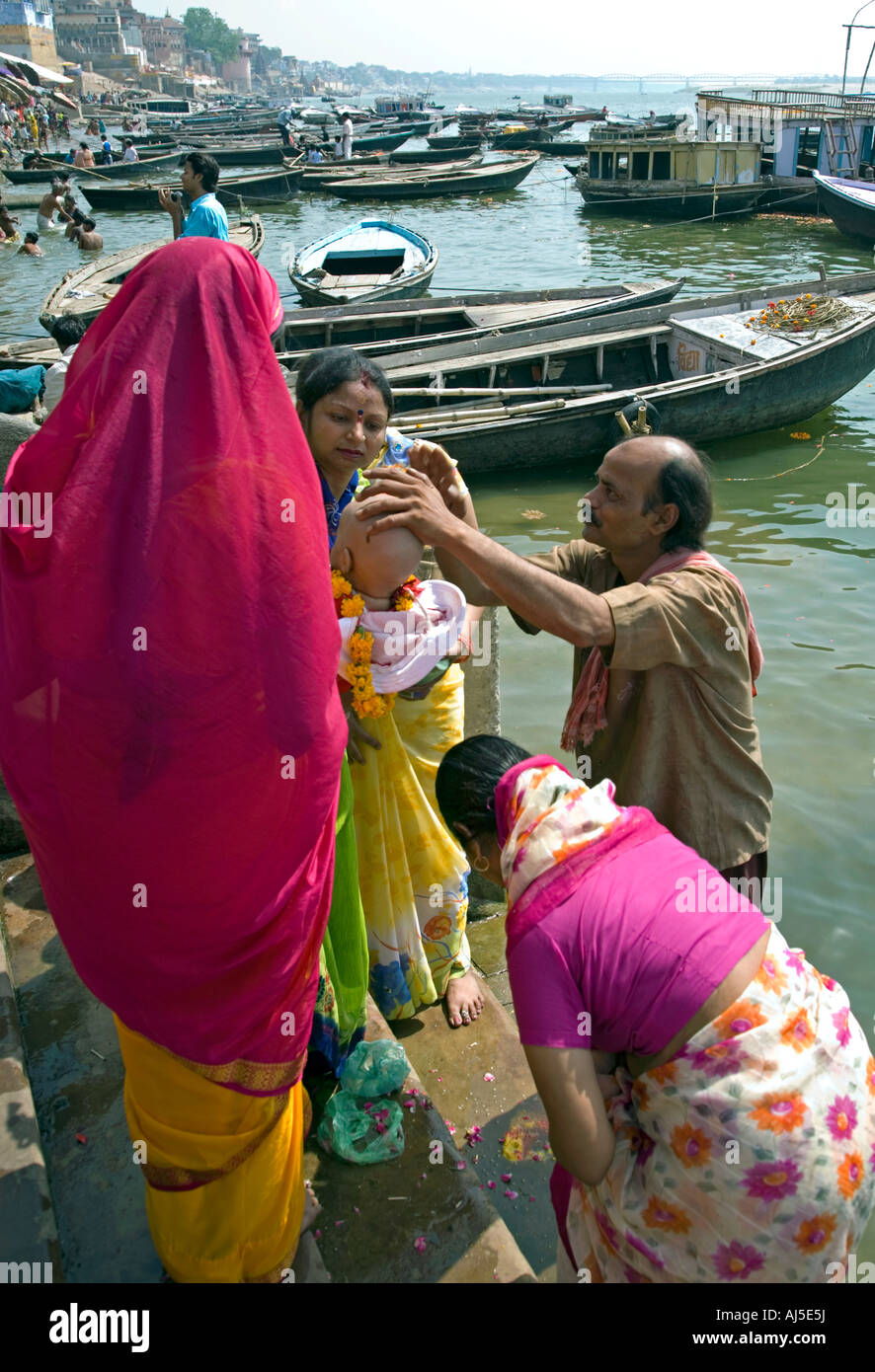 Shaving a baby head. Purification ritual. Dasaswamedh Ghat. Ganges ...
