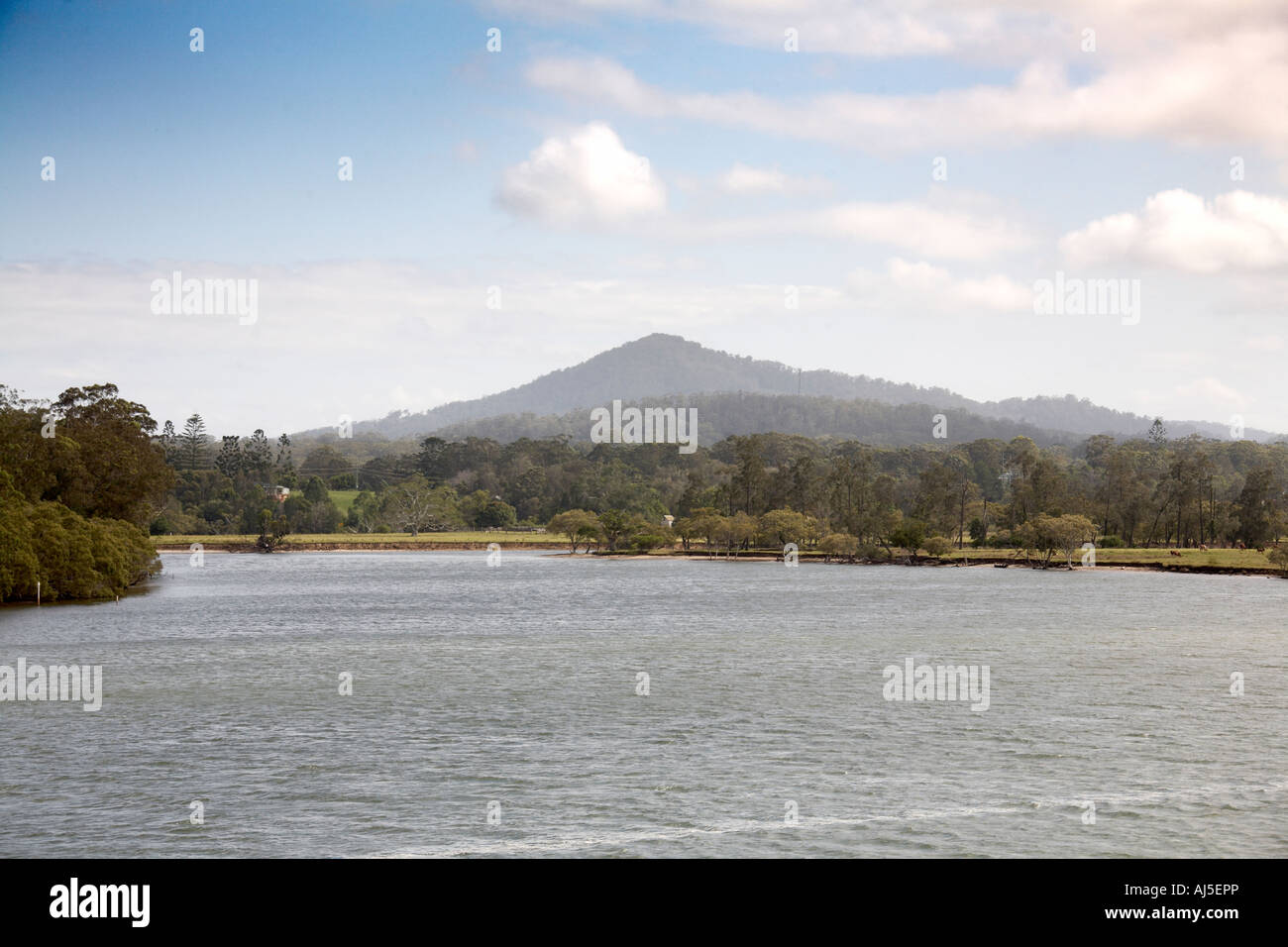 Wide Bellinger River with woods and hills in distance at Raleigh in New ...