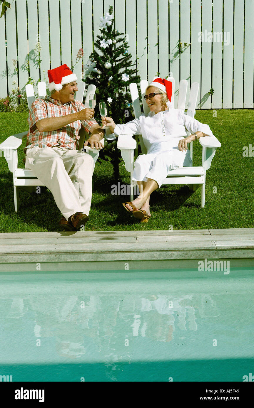 Celebrating christmas by the swimming pool Stock Photo - Alamy