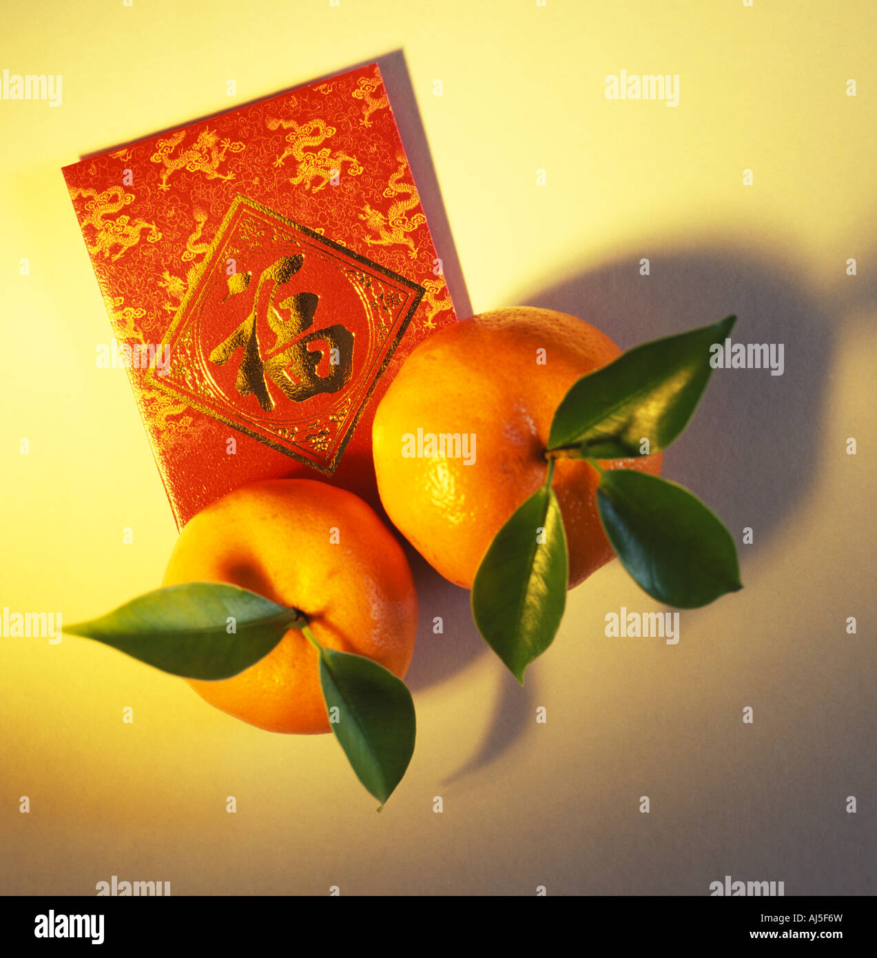 Red packet and a pair of mandarin orange for Chinese New Year Stock ...