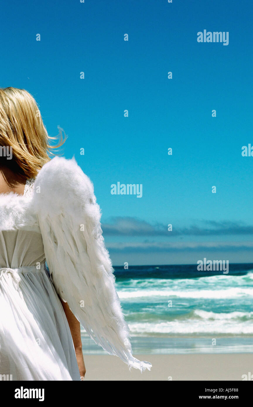 Angel on the beach Stock Photo - Alamy