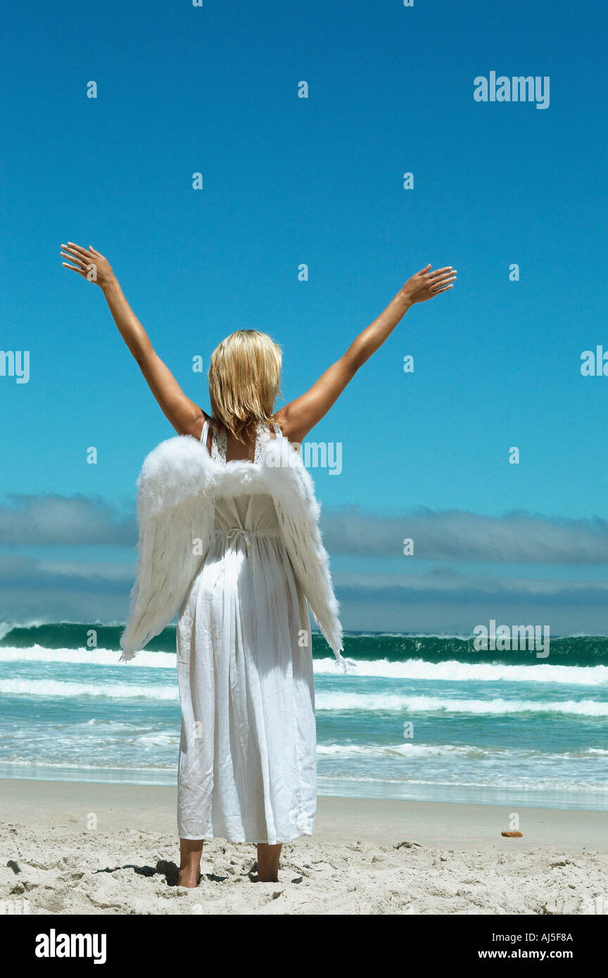 Angel on the beach Stock Photo - Alamy