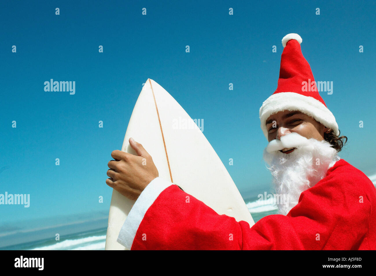 Santa on the beach hi-res stock photography and images - Alamy