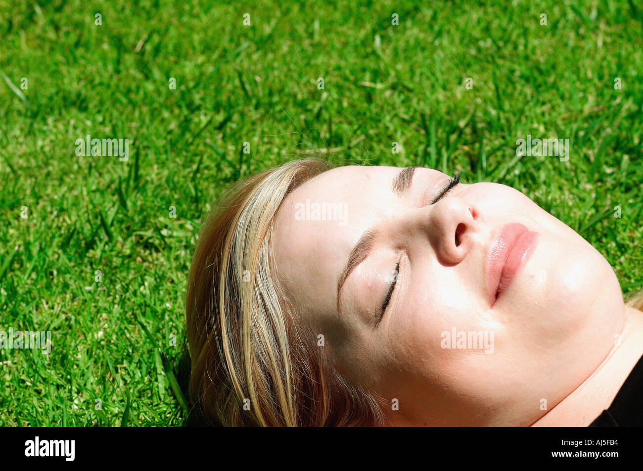 Overweight woman sunbathing hi-res stock photography and images - Alamy