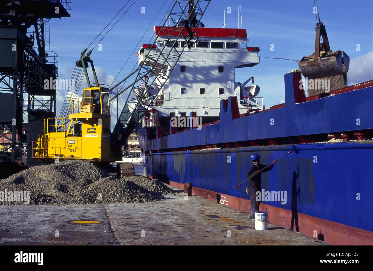 Loading ball clay onto ship Poole Quay Dorset England UK Stock Photo ...