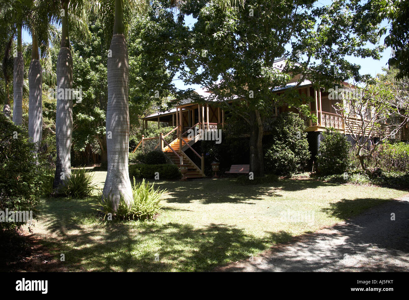 Exterior of old colonial style Queenslander wooden house building with ...