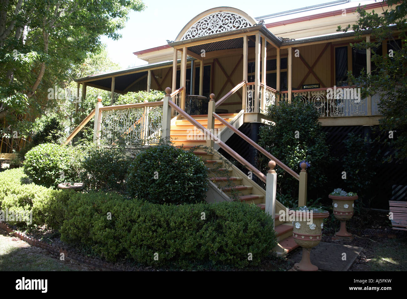 Exterior of old colonial style Queenslander wooden house building with ...