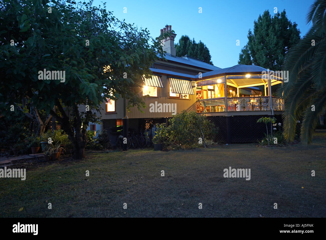 Exterior of old colonial style Queenslander wooden house building with ...