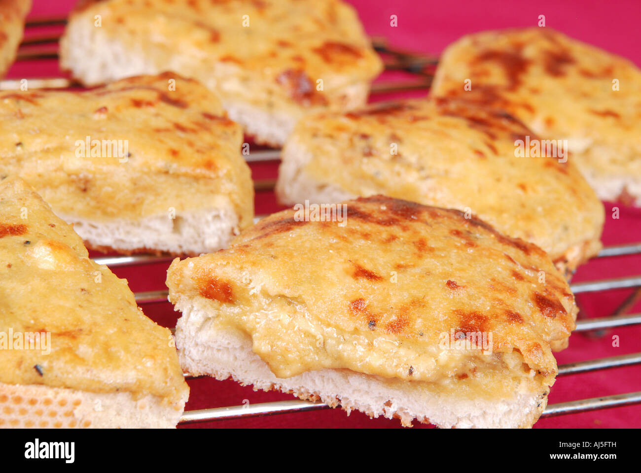 Canapes of Welsh rarebit on toast Stock Photo - Alamy