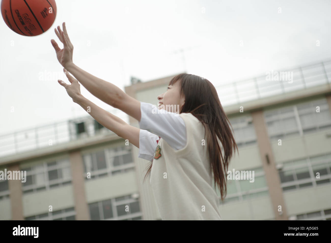 High school student playing basketball hi-res stock photography and ...