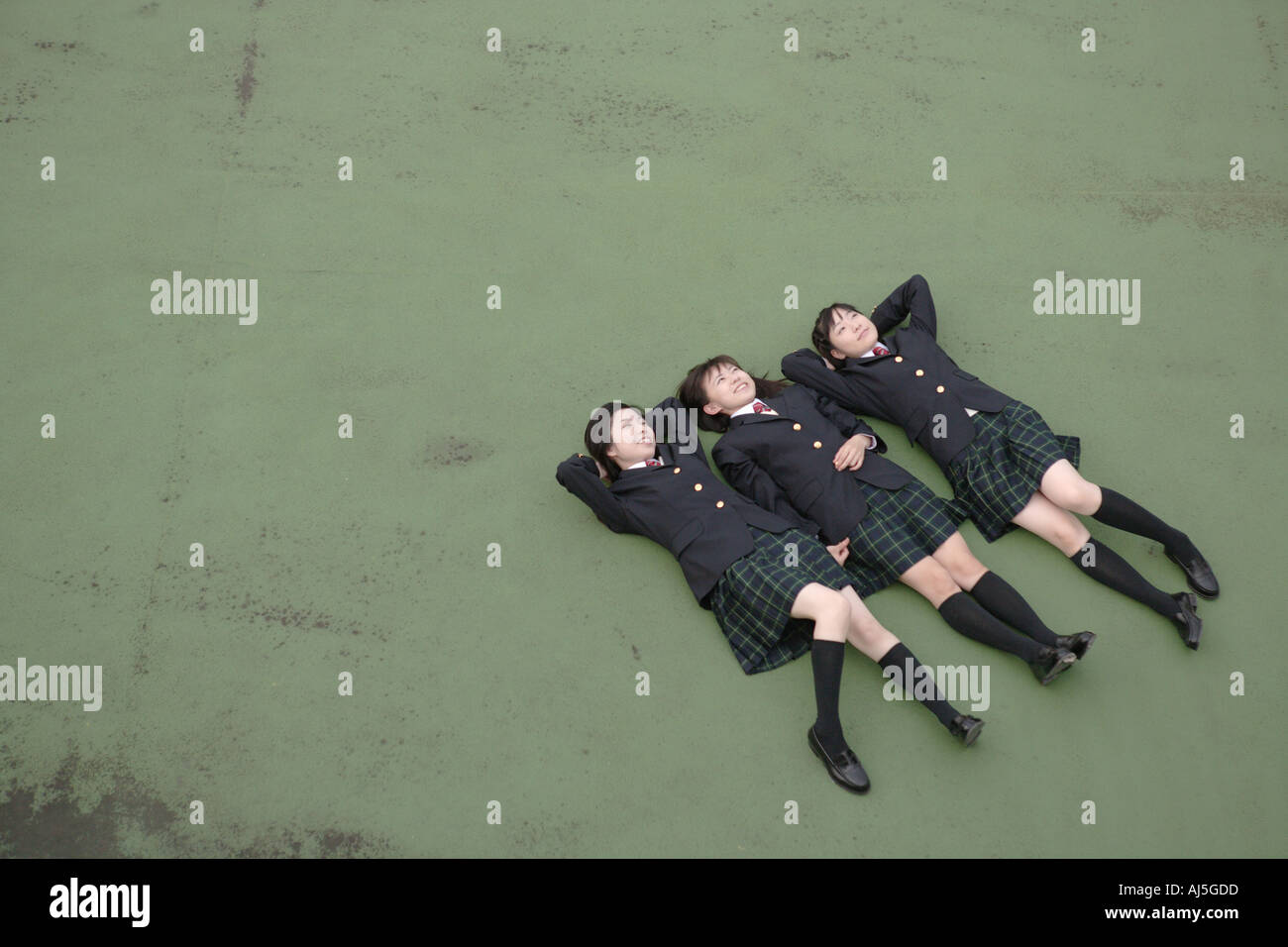High school girl lying down hi-res stock photography and images - Alamy