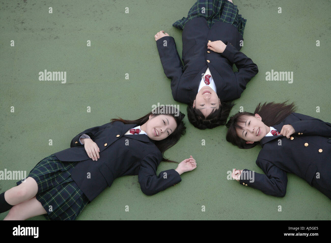 High school girl lying down hi-res stock photography and images - Alamy