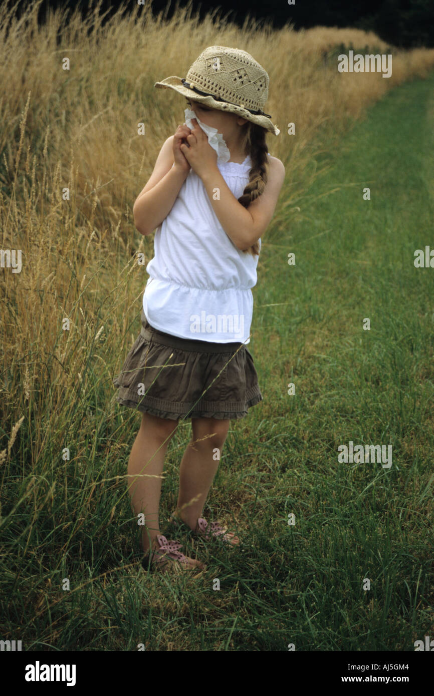 Young Girl Wiping Her Nose Stock Photo - Alamy
