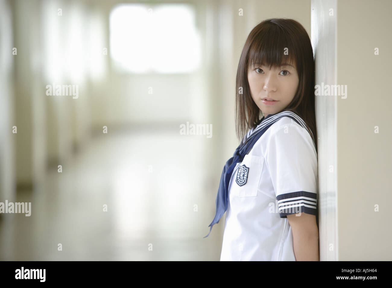 High school girl in school corridor Stock Photo - Alamy