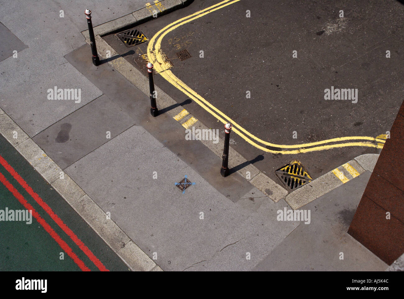 a street corner in the city of london and its markings Stock Photo - Alamy