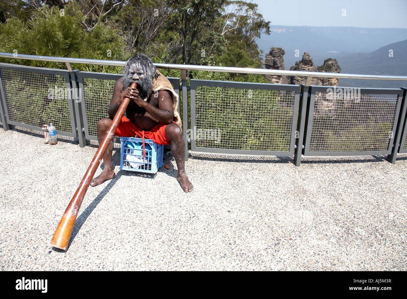Australian aboriginal boy playing music hi-res stock photography and ...