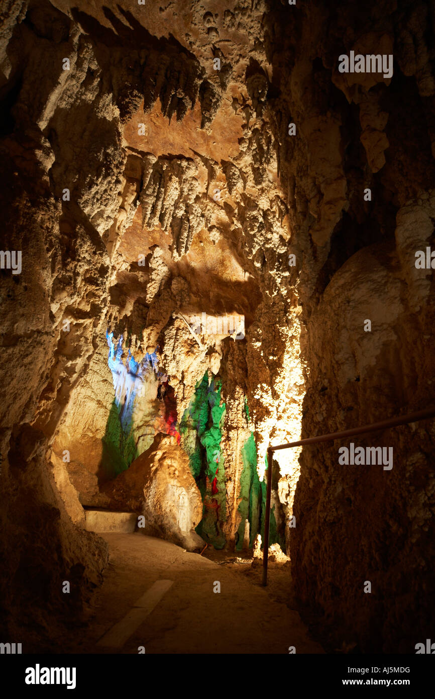 Stalagmites and stalagtites with coloured lights in Chifley Cave at ...