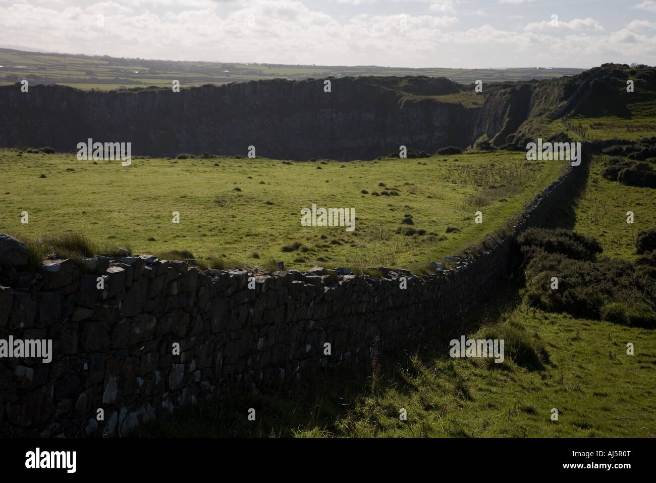 Stock photo of a lush green Irish field with stone fence Shot October ...