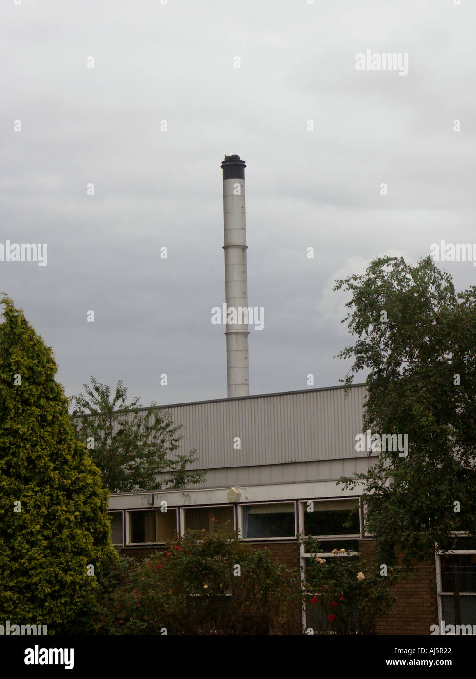 A factory chimney on an industrial estate on the outskirts of Tamworth ...