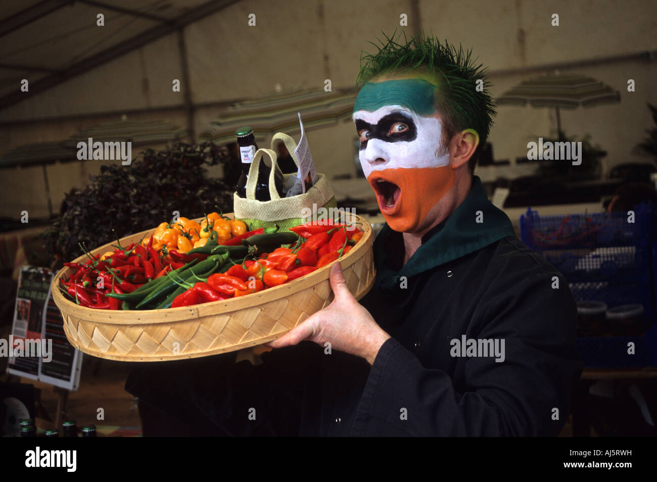 Chilli Chief Demonstrating Hot Chillies Stock Photo - Alamy