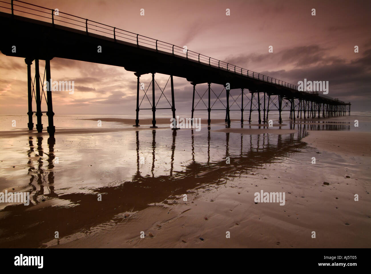 Evening light Saltburn Victorian Pier and beach low tide Saltburn by ...