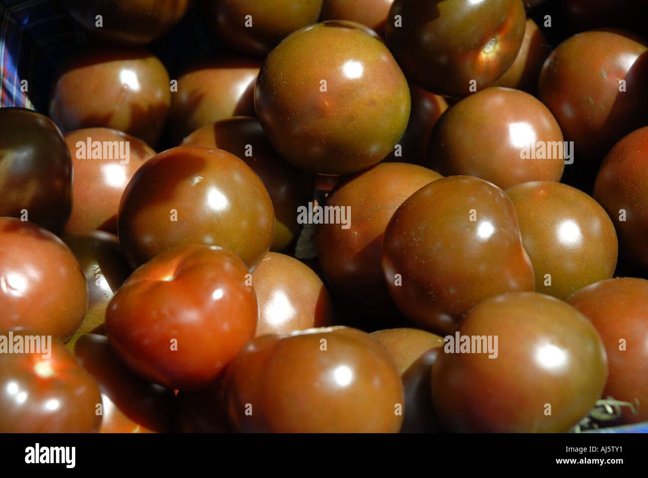 Brown Kumato tomato variety in Borough Market Southwark London Stock ...