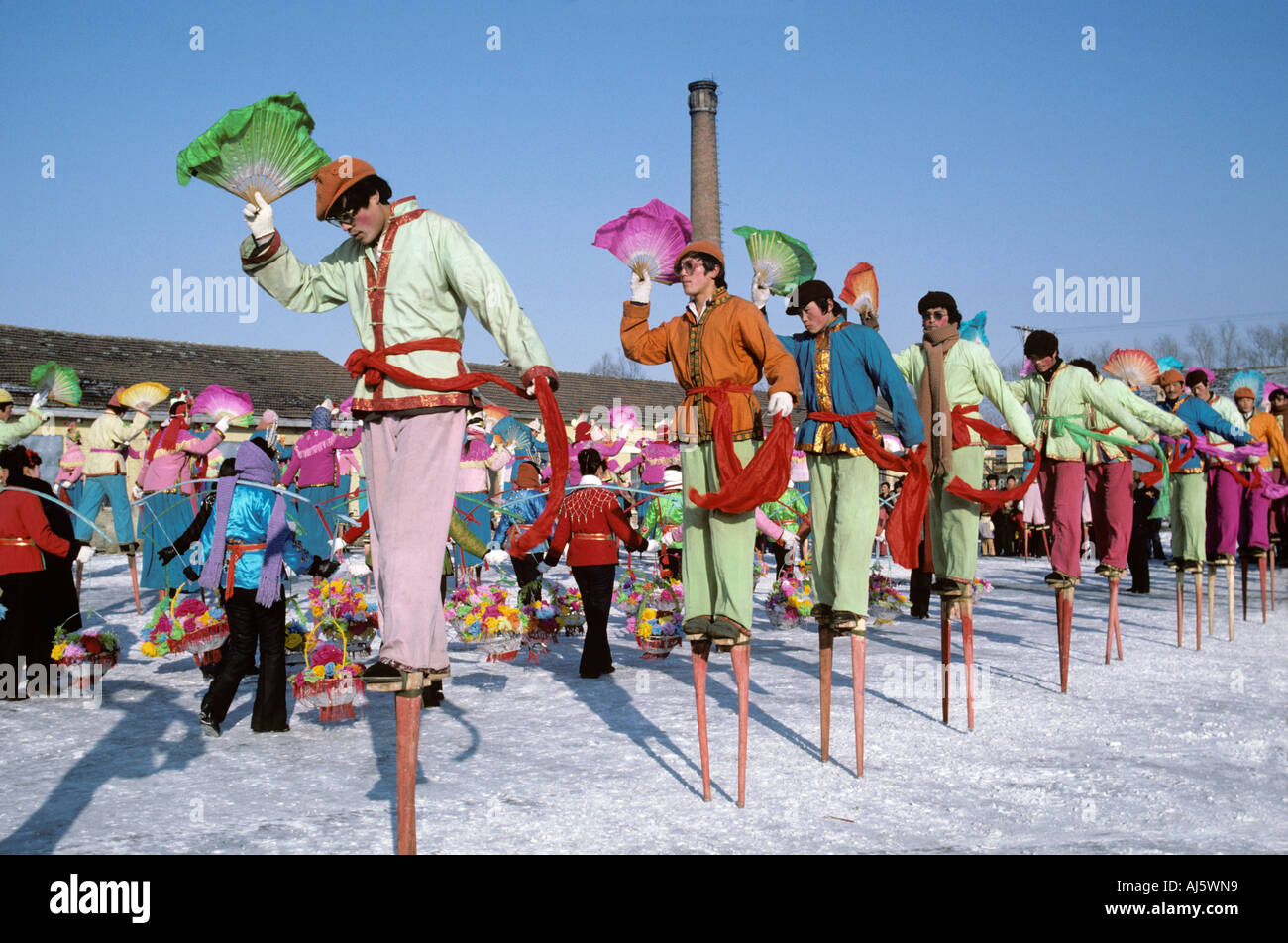 Stilt dancing in China Chinese New Year Stock Photo - Alamy