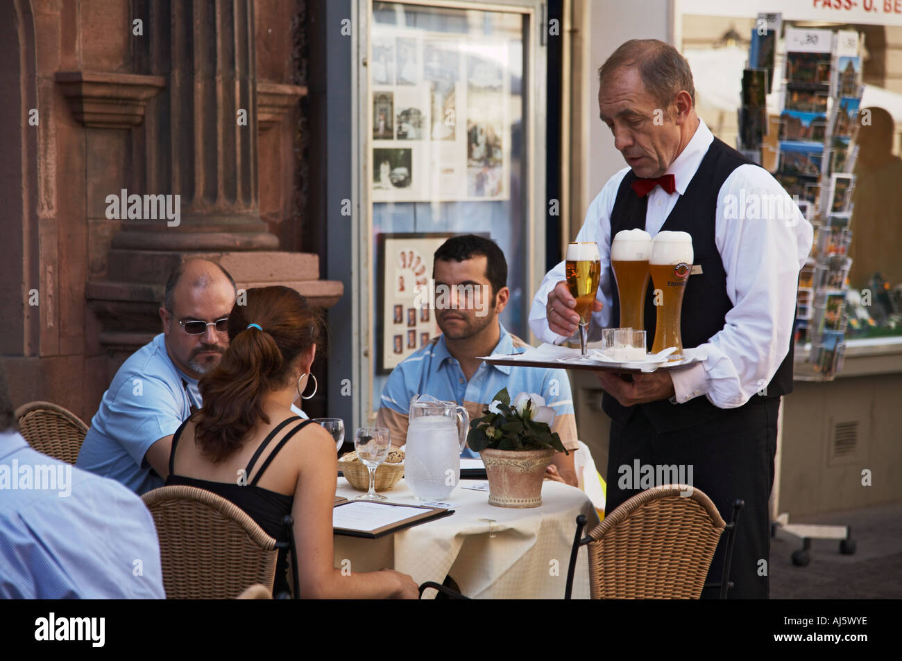 Waiter serving table hi-res stock photography and images - Alamy