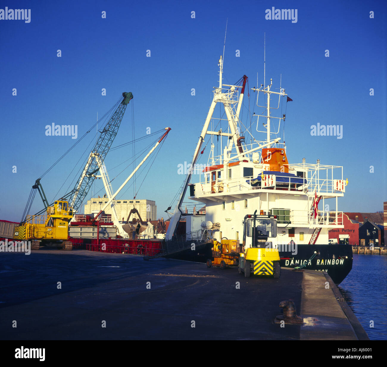 Ship being loaded Poole Quay Dorset England UK Stock Photo - Alamy