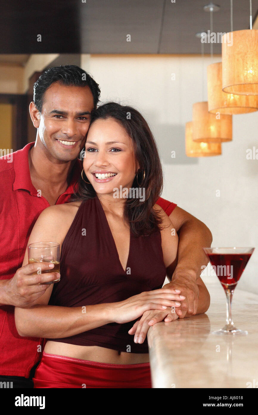 Smiling hispanic couple stands hi-res stock photography and images - Alamy
