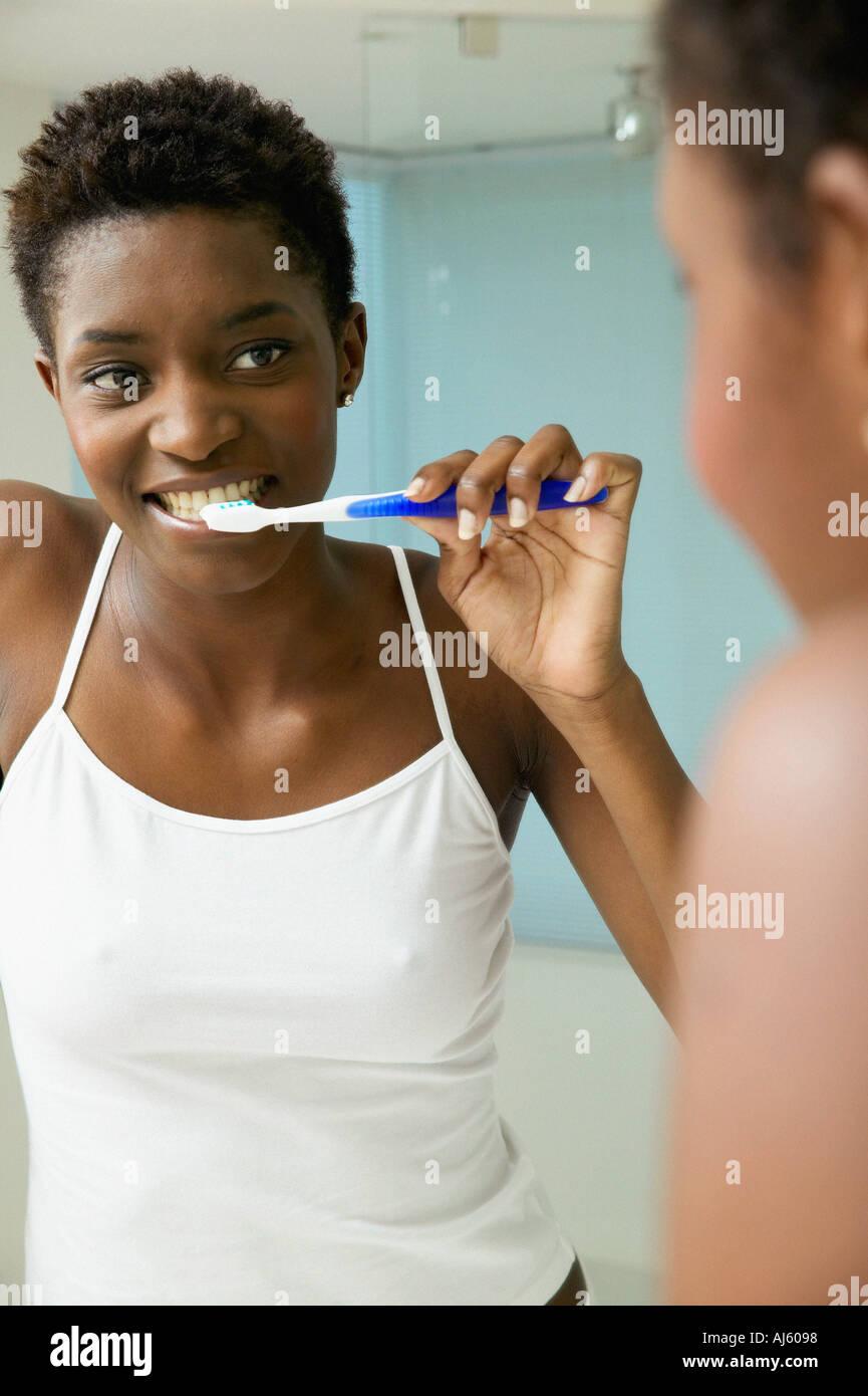 Woman brushing teeth Stock Photo - Alamy