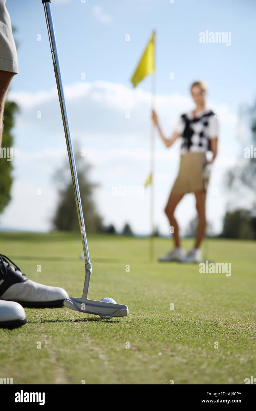 people playing golf Stock Photo - Alamy
