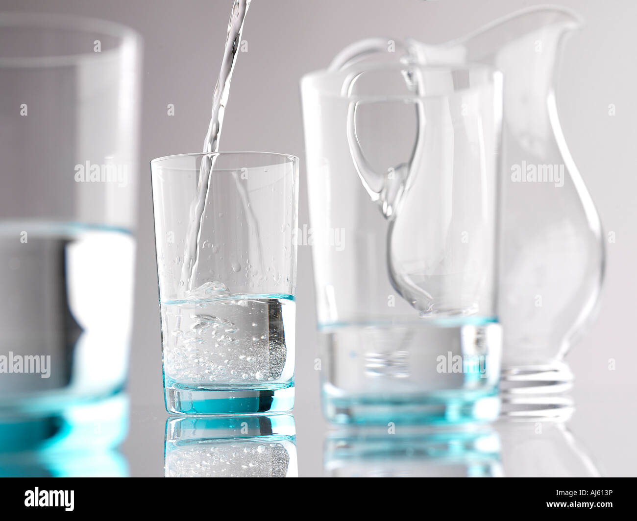 pitcher and glasses filled with water Stock Photo - Alamy
