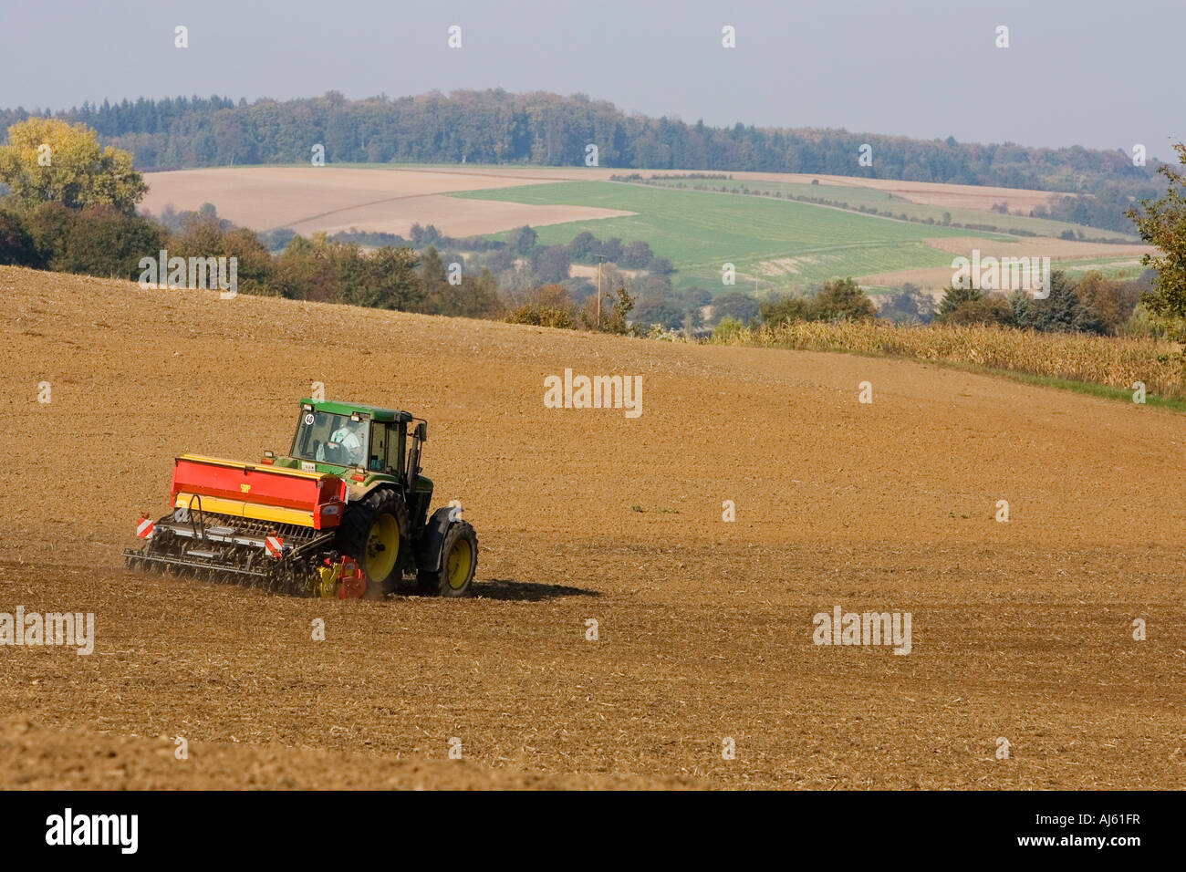 Tractor drilling a field with seed Weingarten Germany October 2007 ...