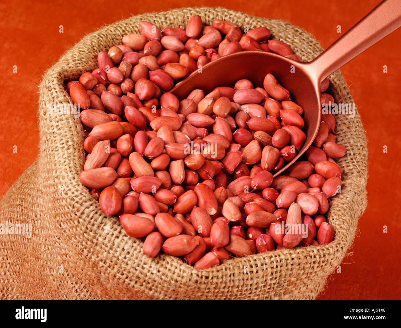 SACK OF RED PEANUT KERNELS Stock Photo - Alamy