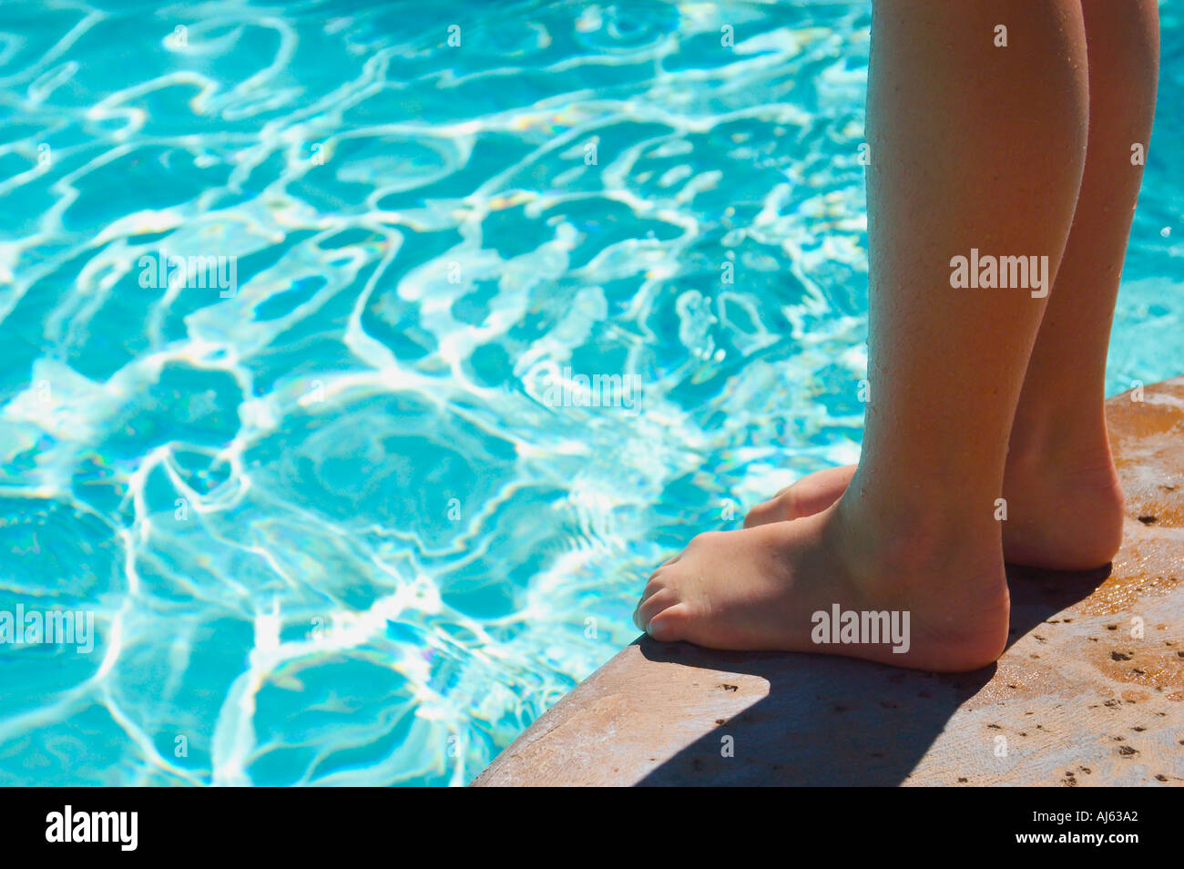 feet by pool Stock Photo - Alamy